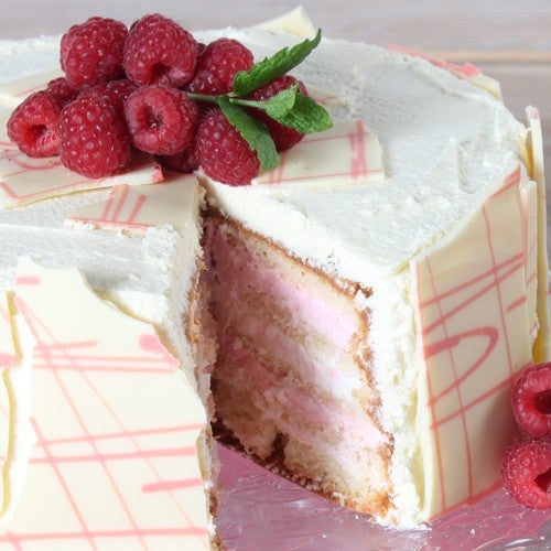 Witte chocolade taart met frambozen - deleukstetaartenshop.nl